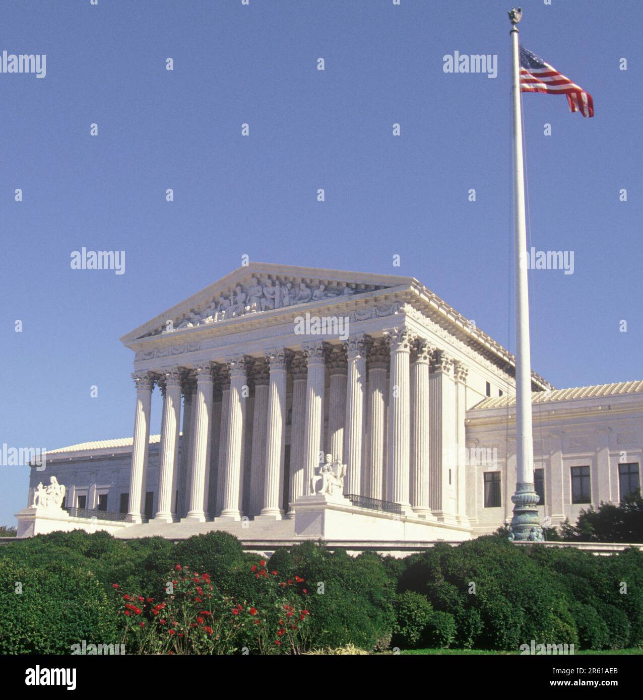 United States Supreme Court Building in Washington DC. American Flag ...