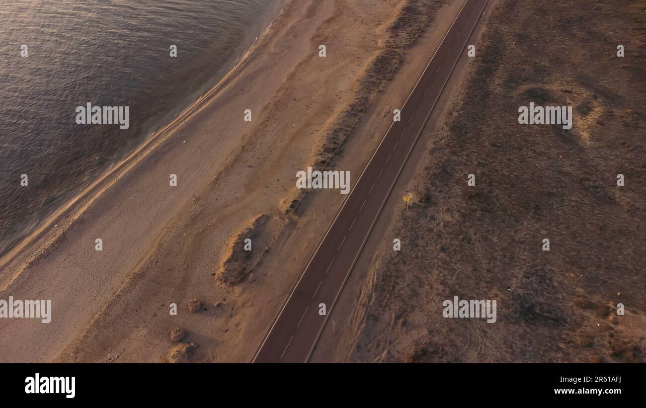 A close-up photograph of a vintage steam train traveling along railway ...