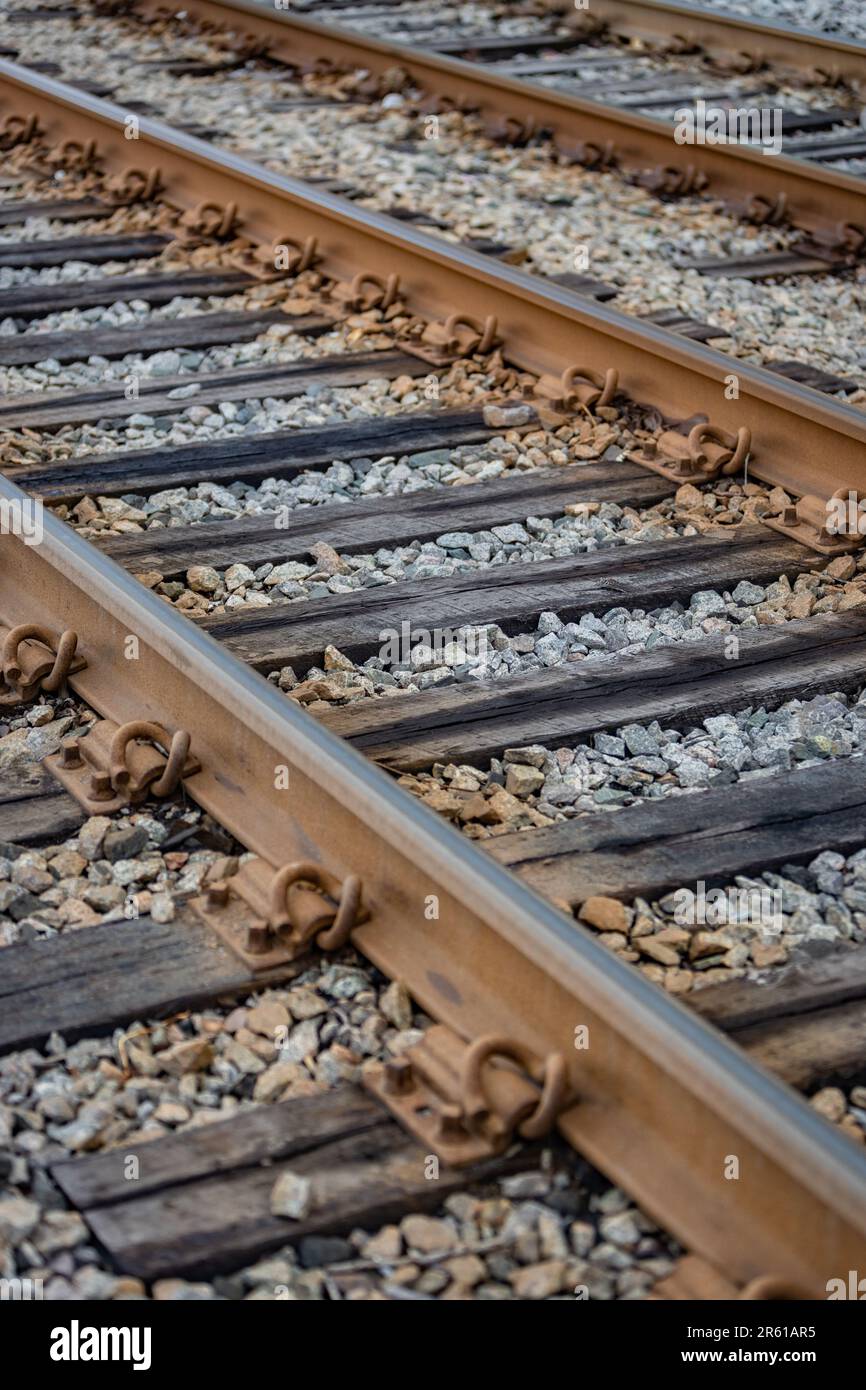 The railway tracks with crushed stone Stock Photo - Alamy