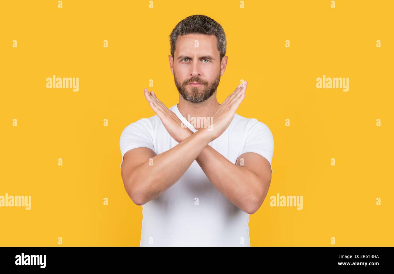 man refuse with denial gesture in studio. photo of denial man show ...