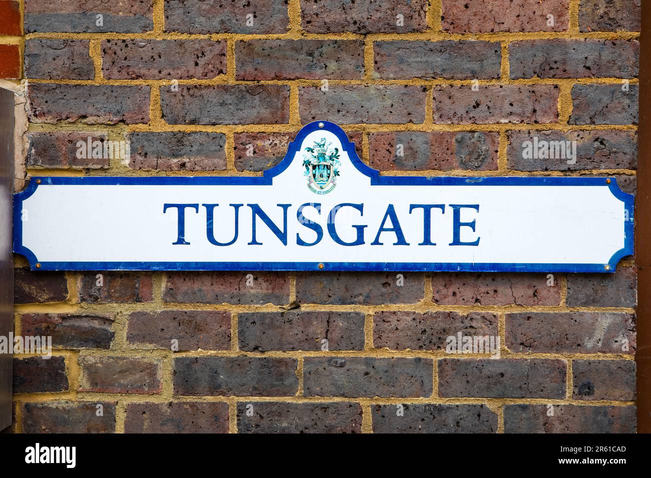 A street sign for Tunsgate in the historic town of Guildford in Surrey ...