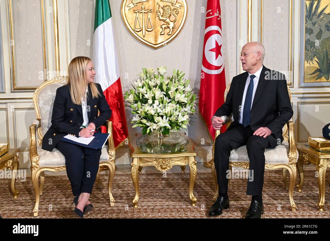 Tunisian President Kais Saied, right, talks with Italian Prime Minister ...