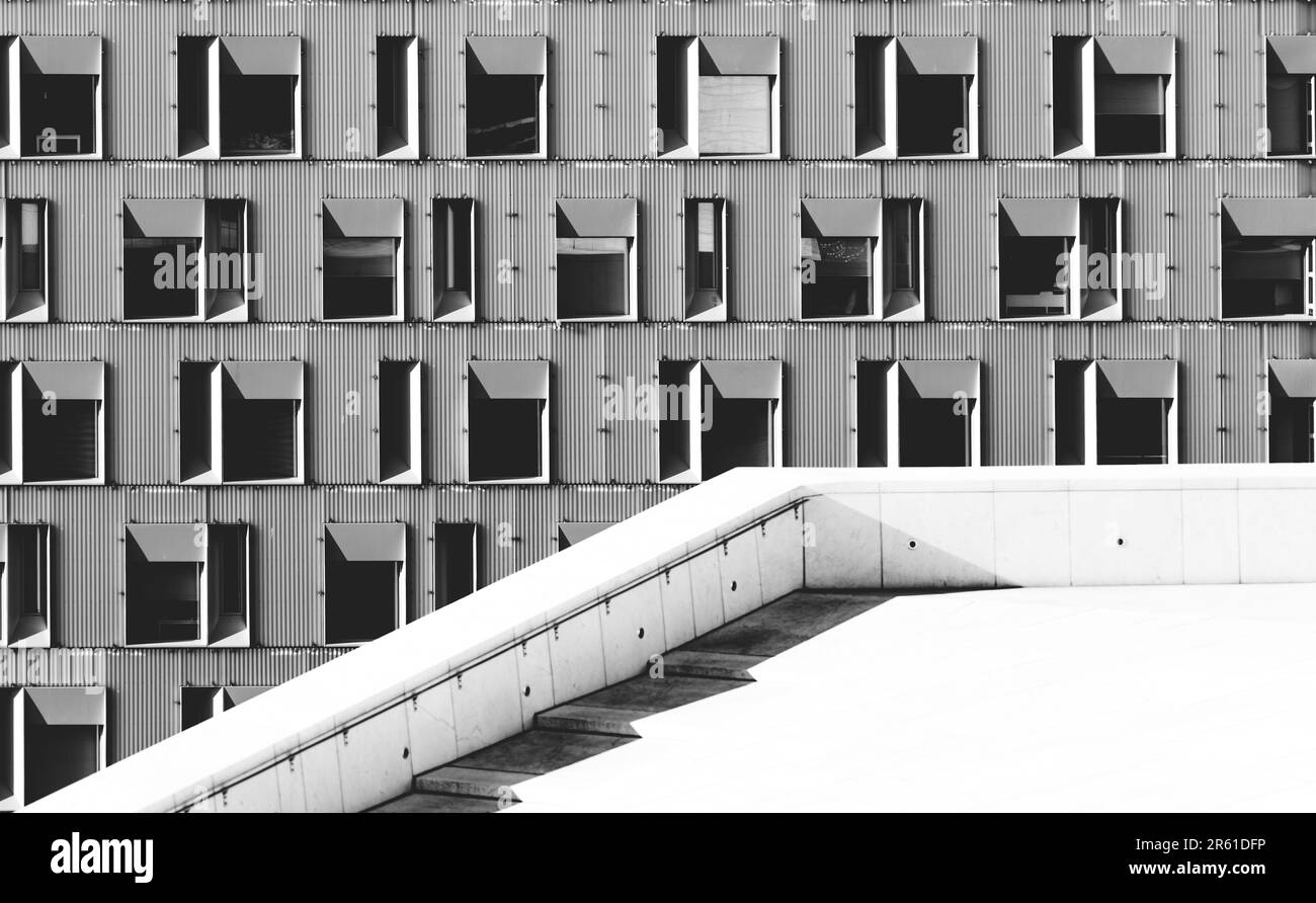 A modern building with a distinct architecture featuring multiple ...