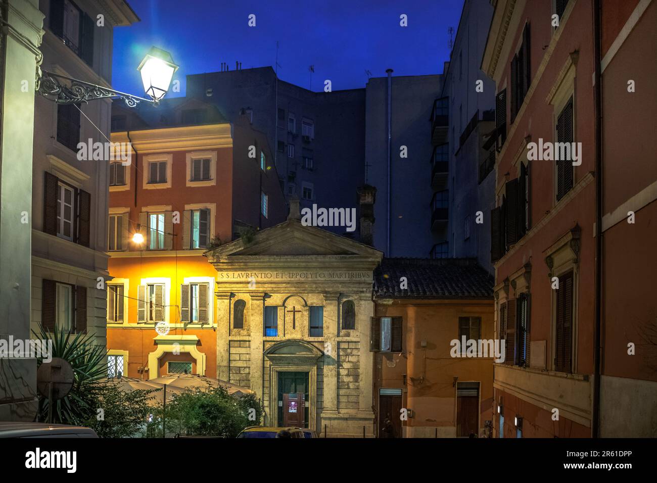 a Night shot with lights and historic buildings from the Streets at ...