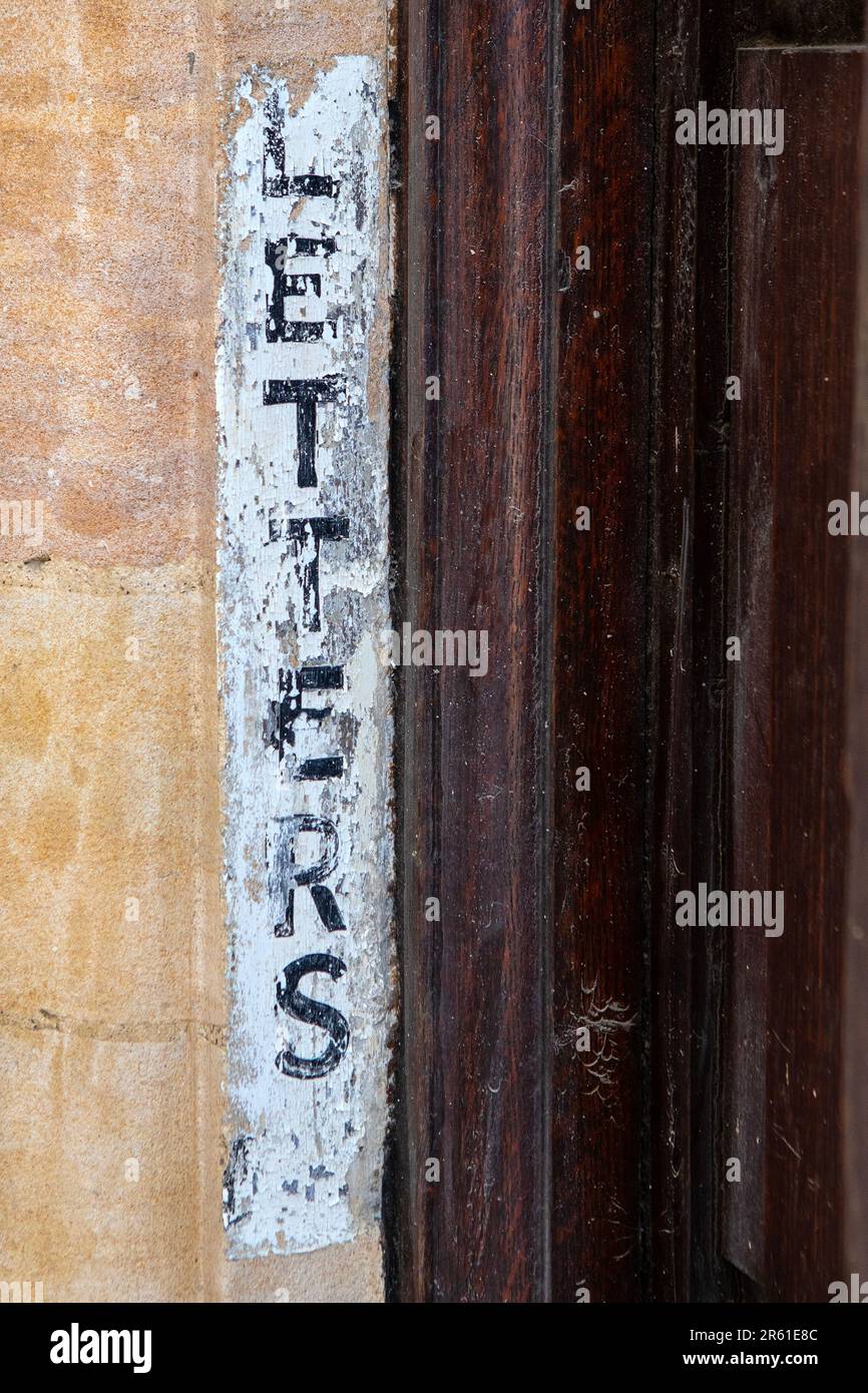 Close-up of a worn Letters sign Stock Photo - Alamy