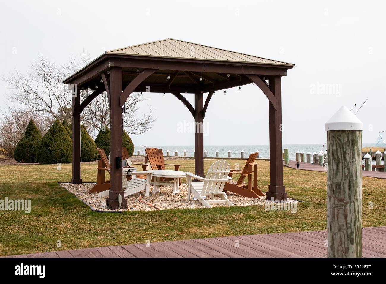 Wooden gazebo pavilion in a backyard waterfront property on Long Island ...