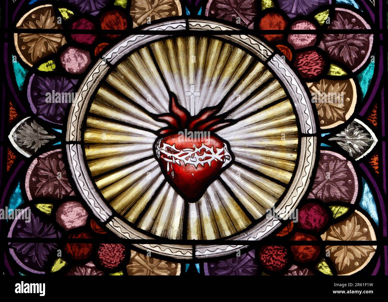 Stained glass depicting the sacred heart is at the entrance to Sacred ...