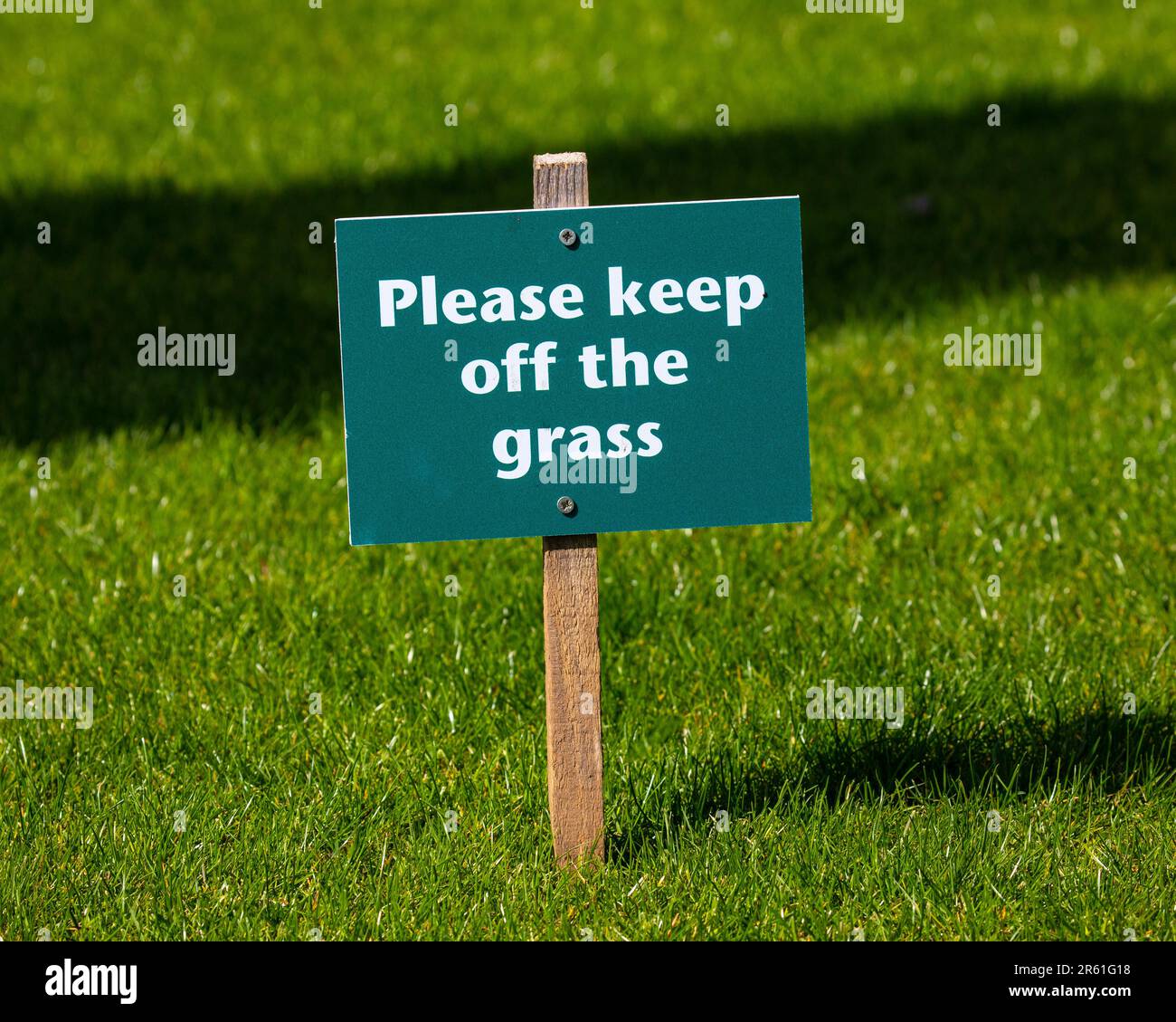 A Please Keep off the Grass sign Stock Photo - Alamy