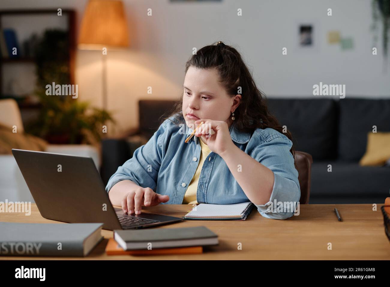 Down syndrome student laptop hi-res stock photography and images - Alamy