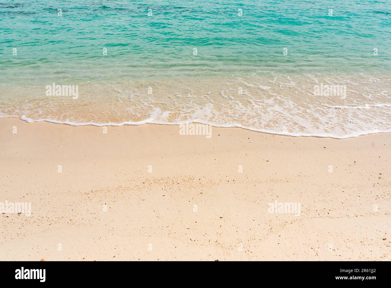 Seashore with transparent waters. Vacation paradise Stock Photo - Alamy
