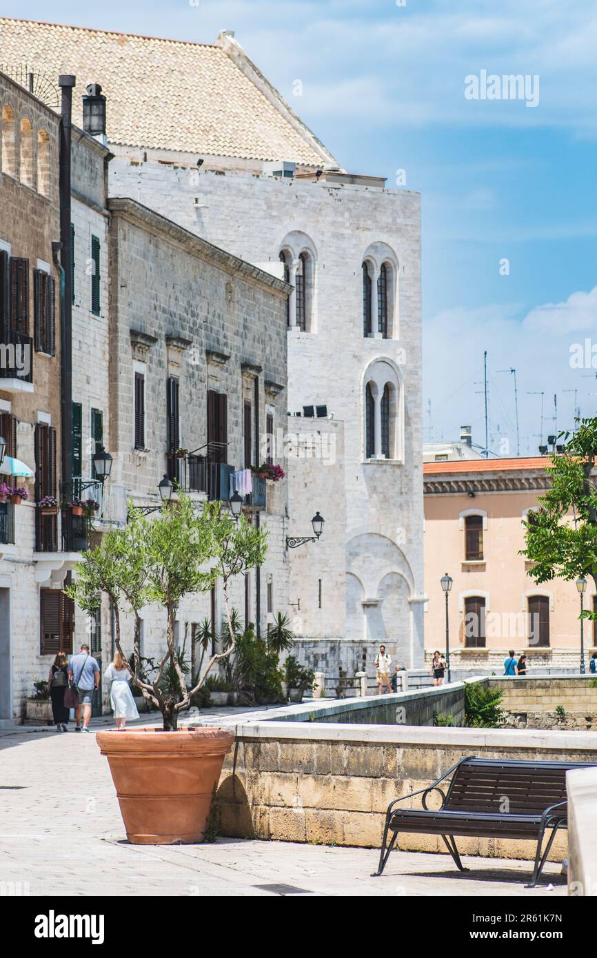 Tourists walking on the ancient walls with Pontifical Basilica or ...