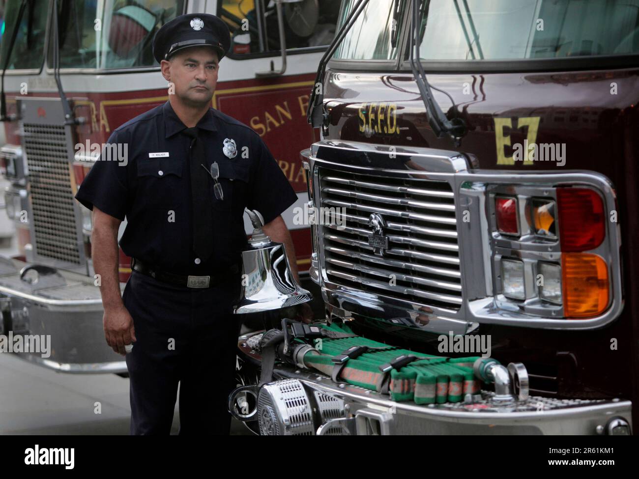 Firefighter Pete Walker rings a bell on a fire engine at Station 7 at ...