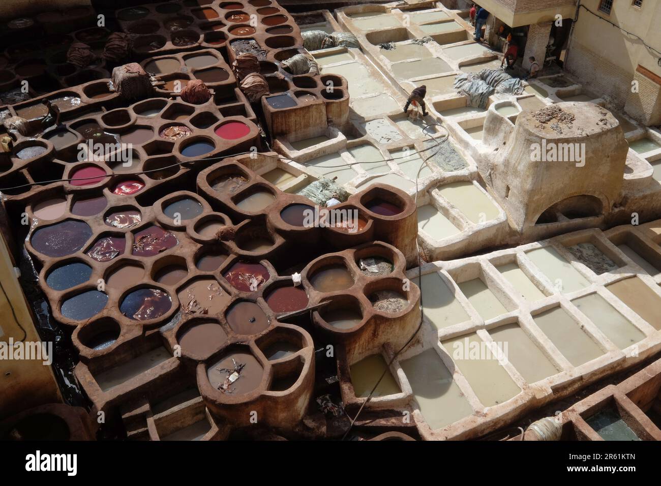 Tanneries of Fes, Leather dying in a traditional tannery. Old ...