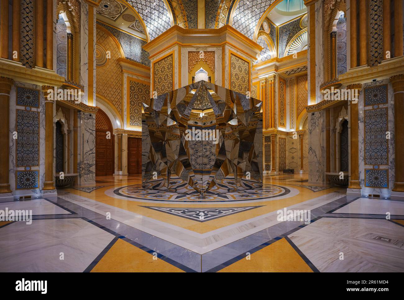 A scenic view of an interior with a stunning golden floor and ceiling ...