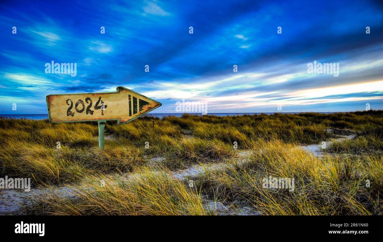 Image of a signpost pointing in the direction of the year 2024 Stock ...