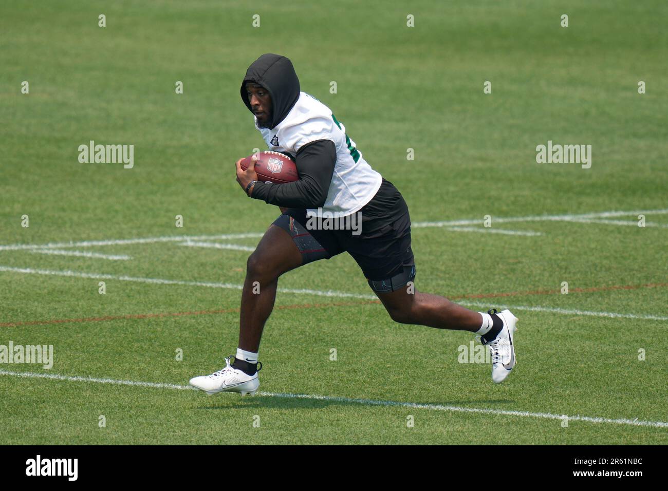 New York Jets' Breece Hall participates in a drill at the NFL football ...