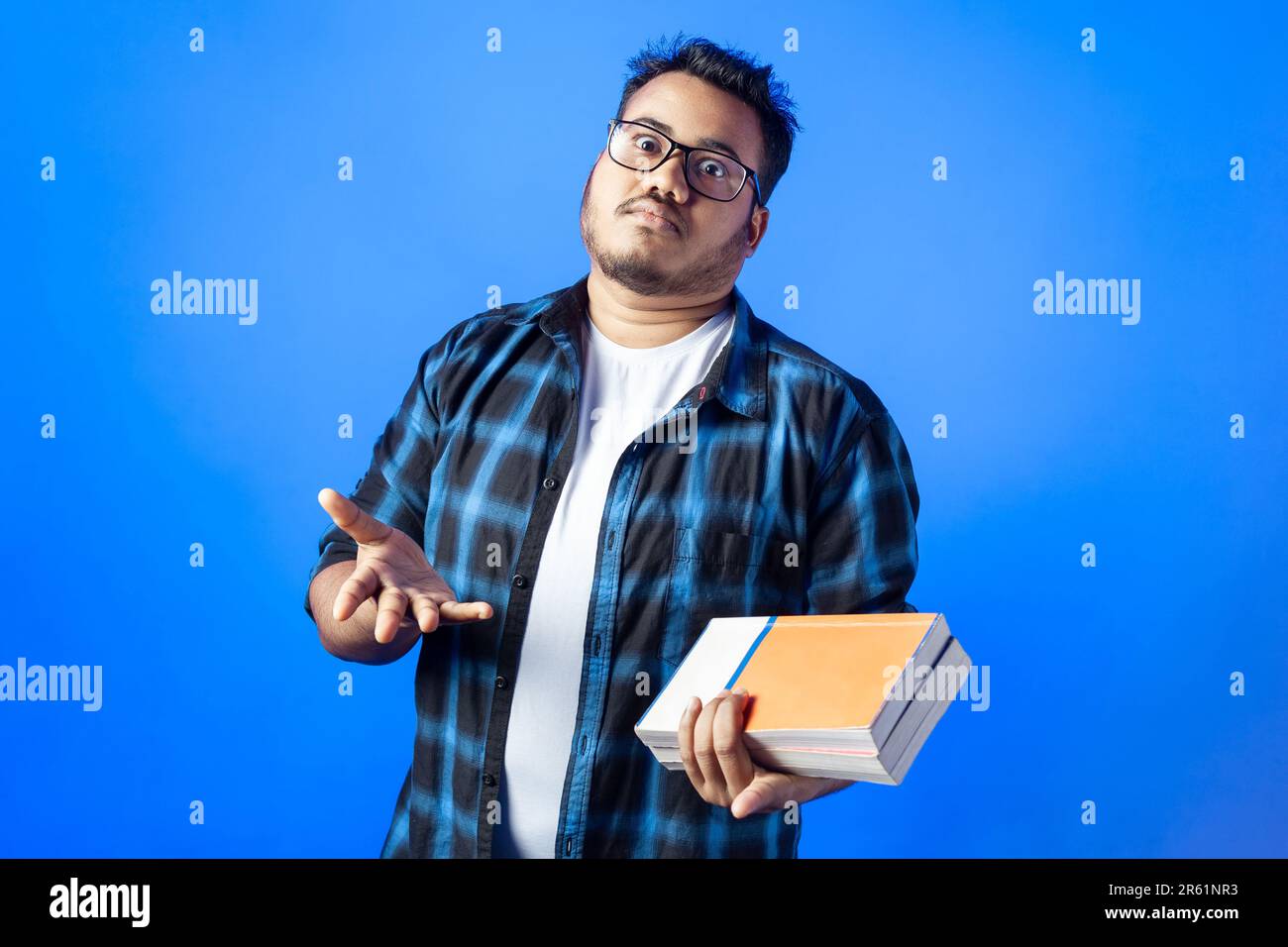 shocking and confusion facial expression of a indian collage student ...