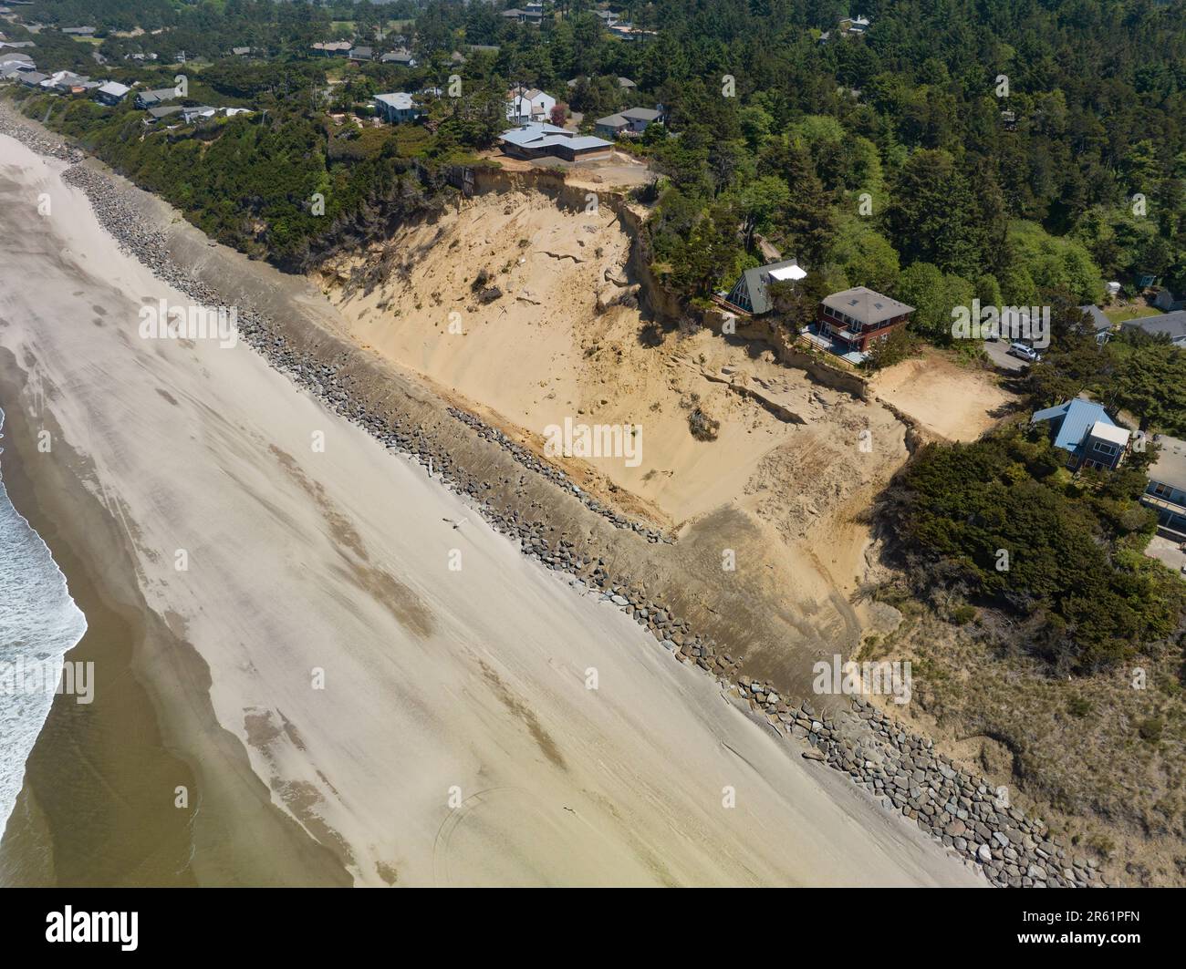 Only a slide of sand remains after beachfront homes were destroyed with ...