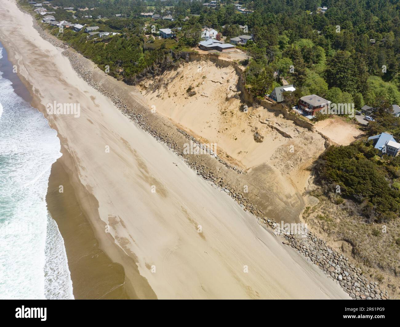 Only a slide of sand remains after beachfront homes were destroyed with ...