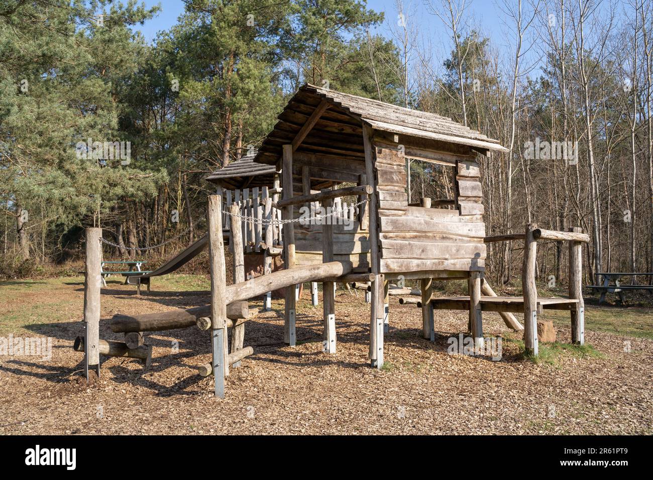 Wooden playground for children with play house, climbing frame and a ...