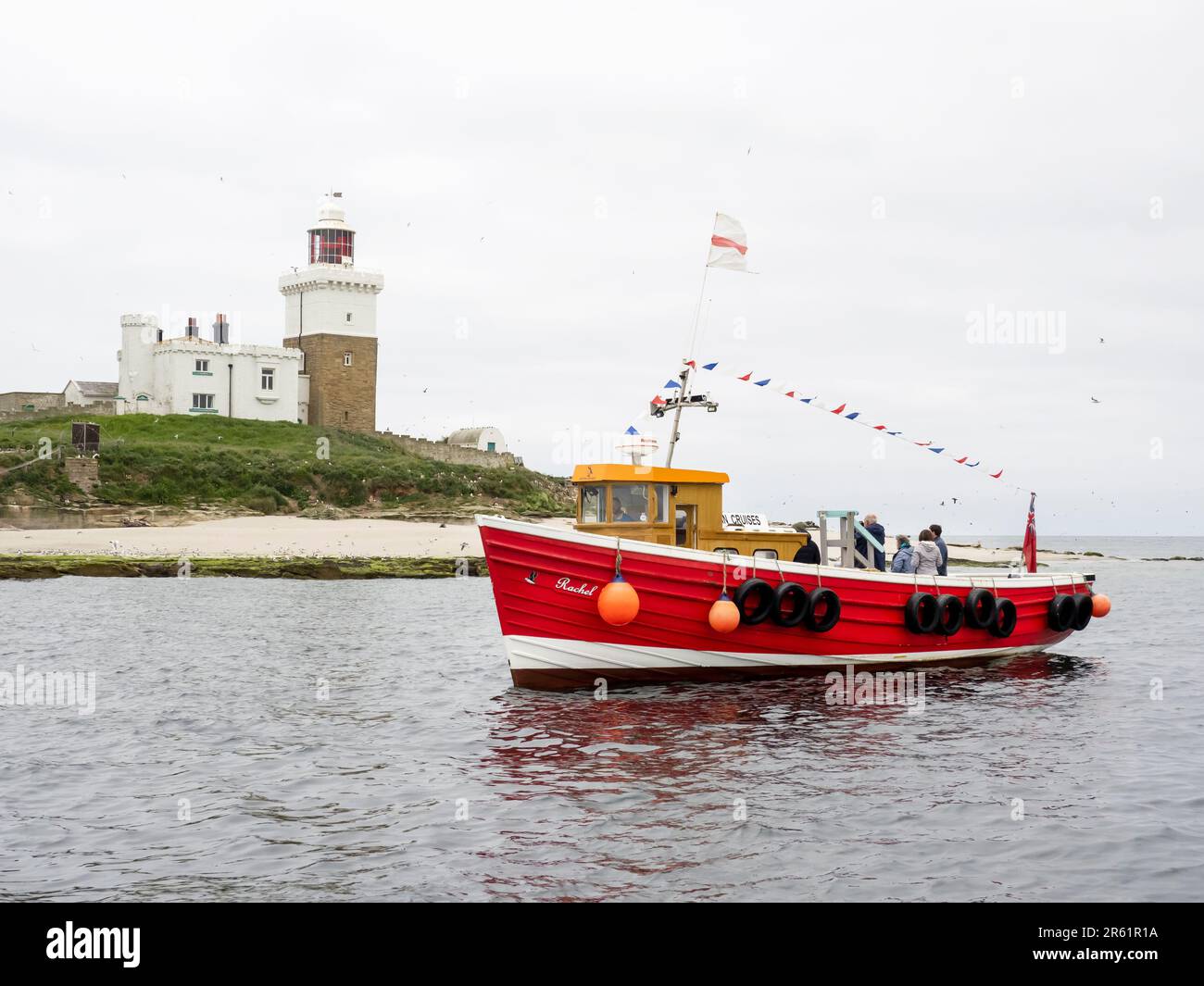 A tourist boat taking people to view the Puffins and orther seabirds at ...
