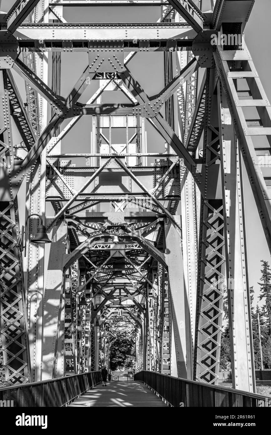 A pedestrian bridge spans a river in Salem, Oregon Stock Photo - Alamy