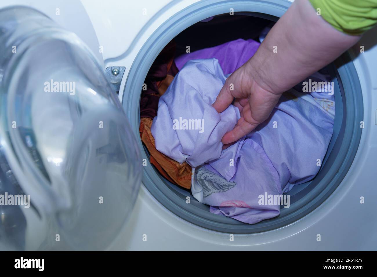 Laundry womans arm hi-res stock photography and images - Alamy