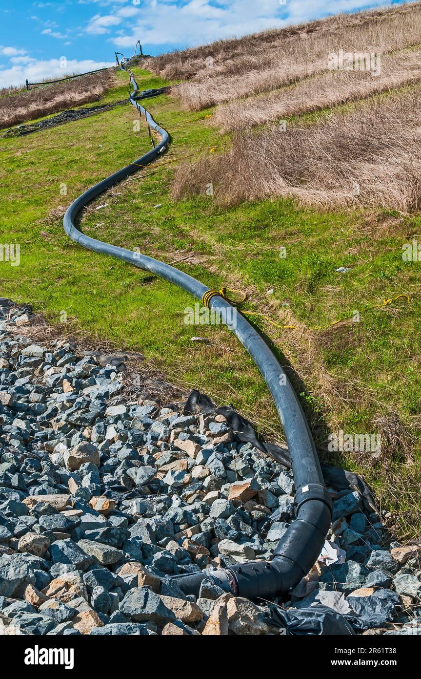 PVC Tubing stretches across the landscape into the distance in an ...