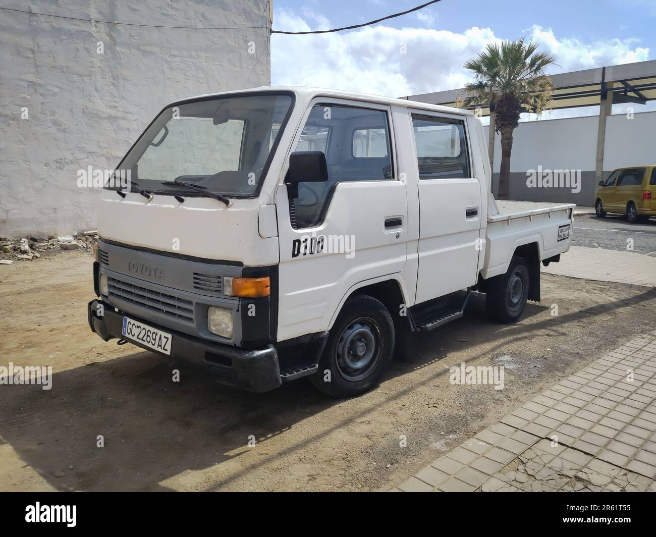 A view of an old white Toyota Hiace van parked outdoors Stock Photo - Alamy