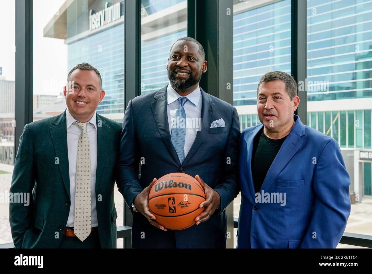 Milwaukee Bucks general manager Jon Horst, left, poses for a picture ...
