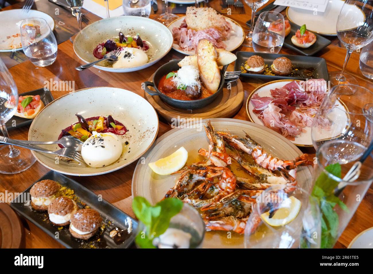 A delicious Spanish meal with an array of dishes including jamon ...