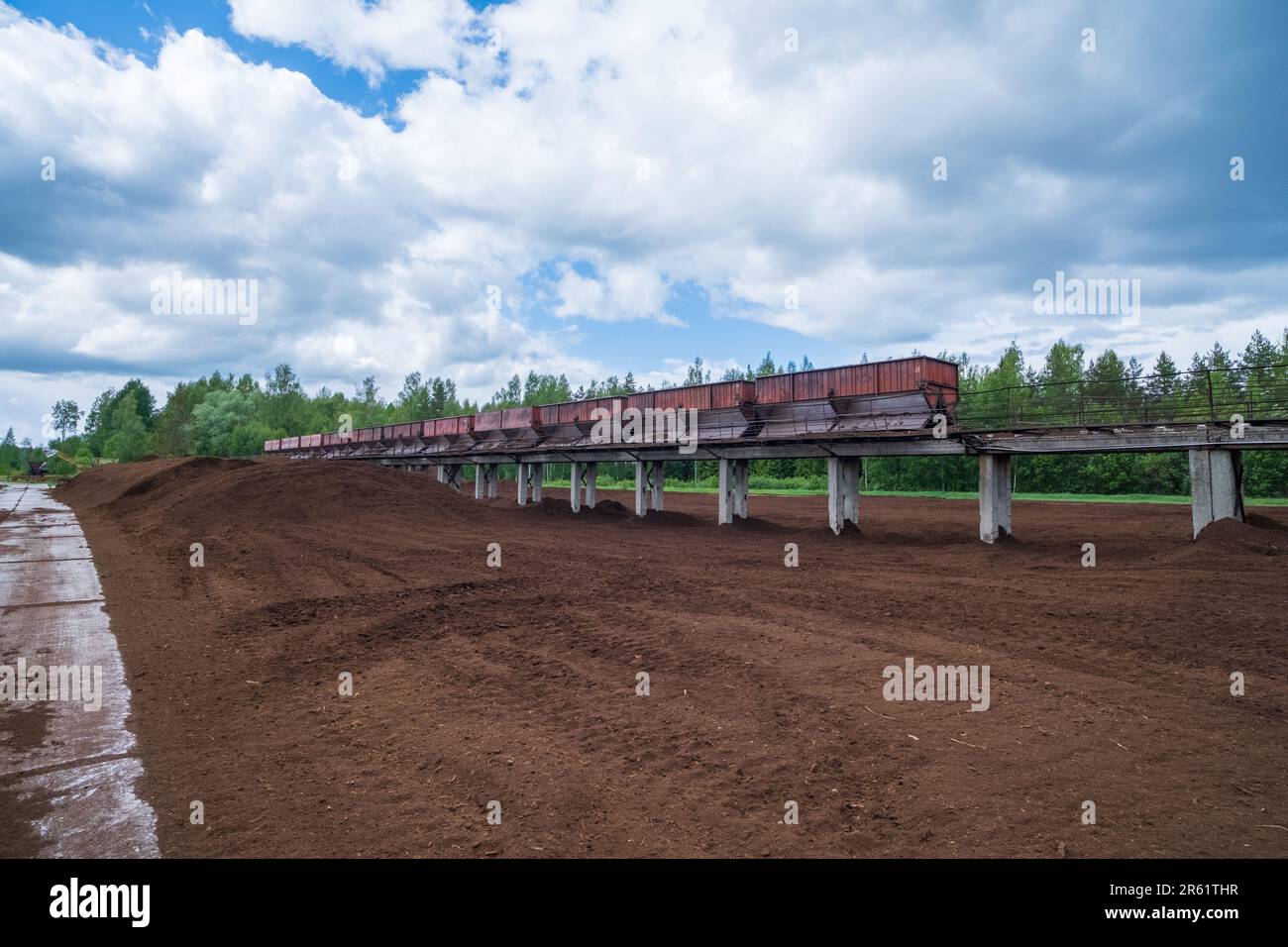 peat transport wagons at the loading point. Raised platform for loading ...