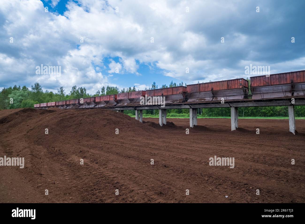 peat transport wagons at the loading point. Raised platform for loading ...