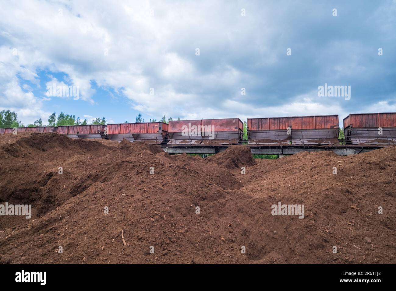 peat transport wagons at the loading point. Raised platform for loading ...