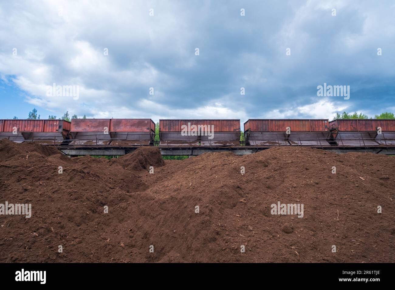 peat transport wagons at the loading point. Raised platform for loading ...