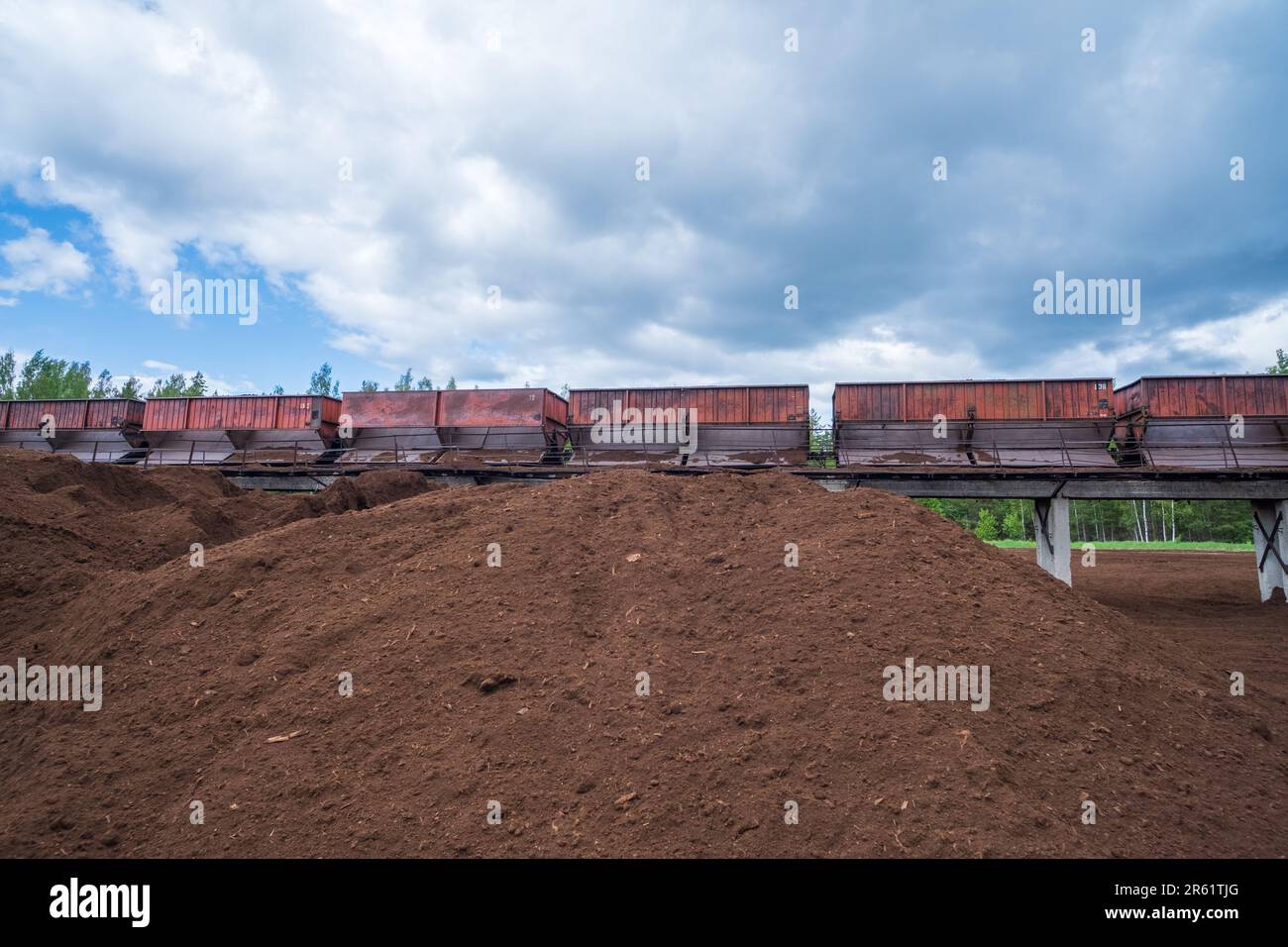 peat transport wagons at the loading point. Raised platform for loading ...