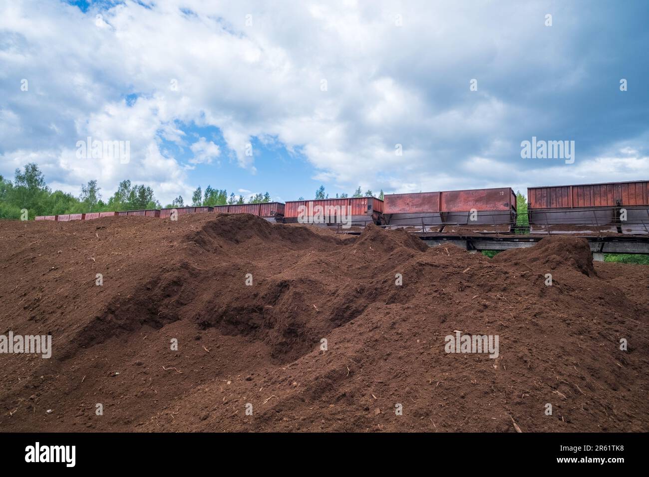 peat transport wagons at the loading point. Raised platform for loading ...