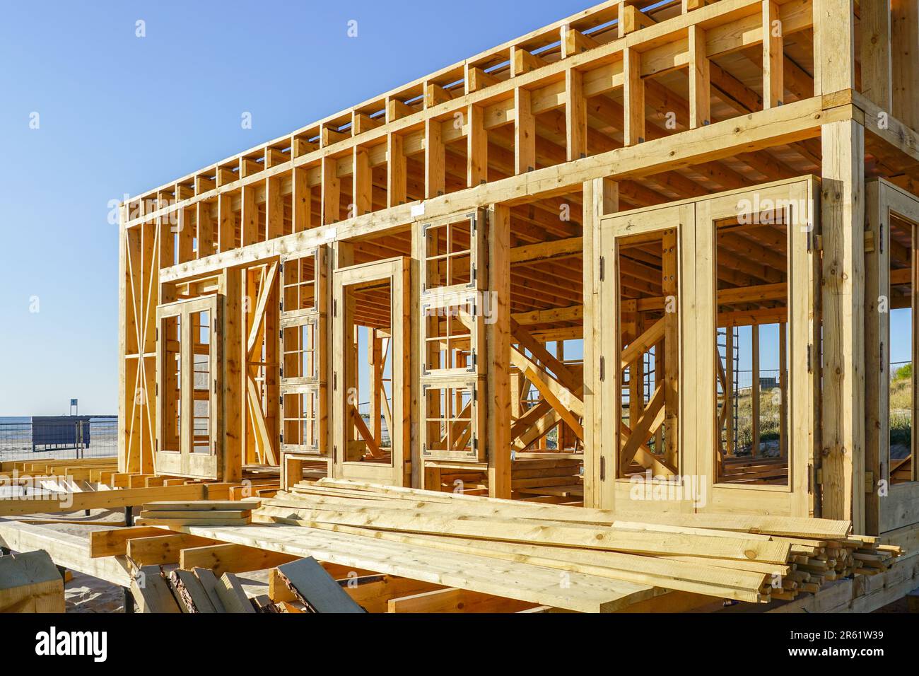 Construction of a new natural wood building on the Baltic seashore for ...