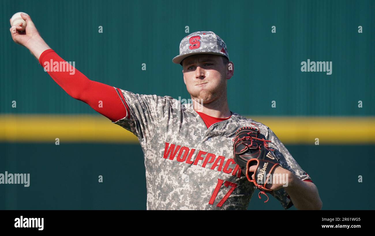 NC State pitcher Sam Highfill warms up before an NCAA baseball game ...