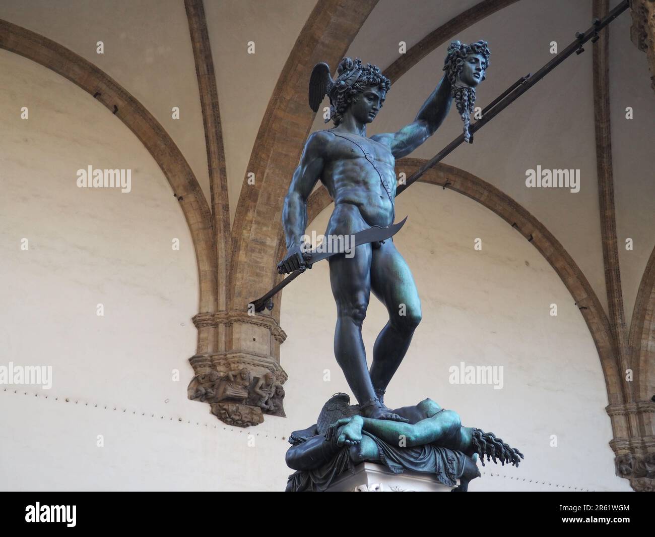 The sculpture of Perseus, holding the decapitated head of the monster ...