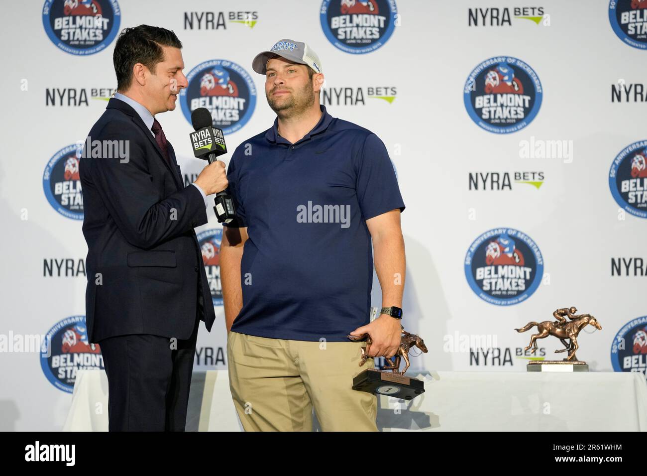 Trainer Brad Cox, right, speaks after randomly selecting the first ...