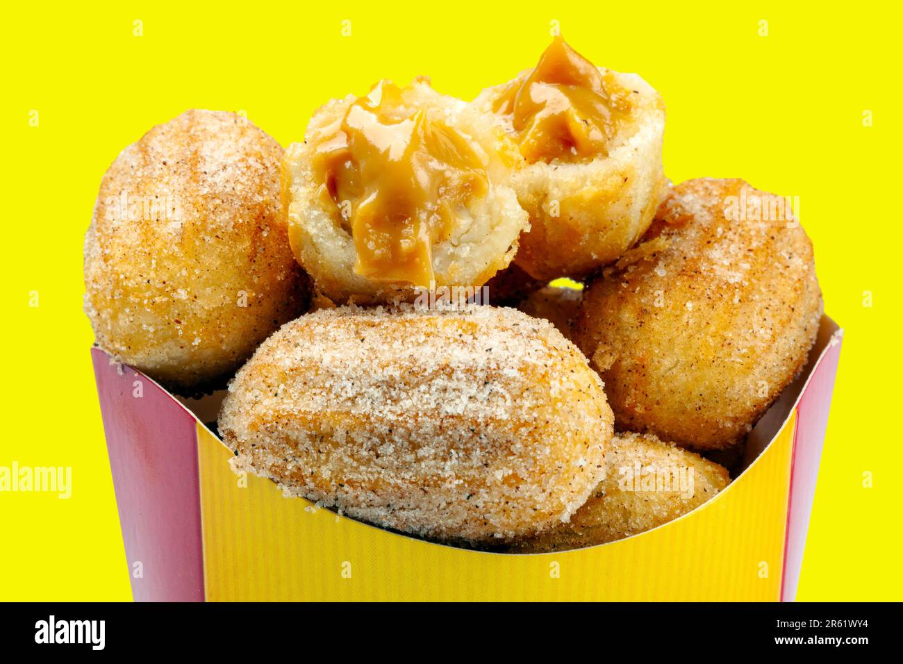 Sweet milk mini churros Stock Photo - Alamy