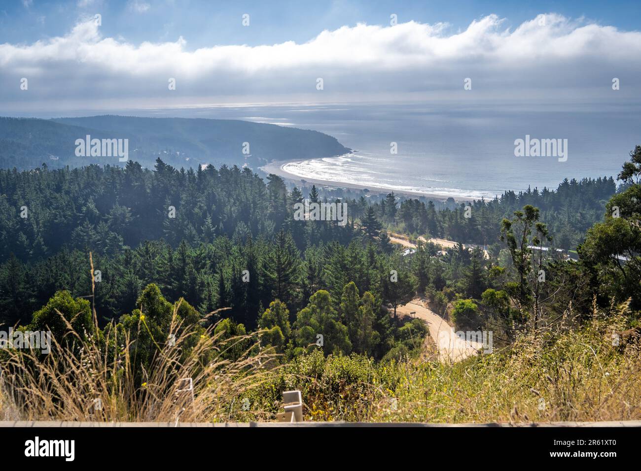 Aerial view of picturesque coastal landscape featuring mountain range ...