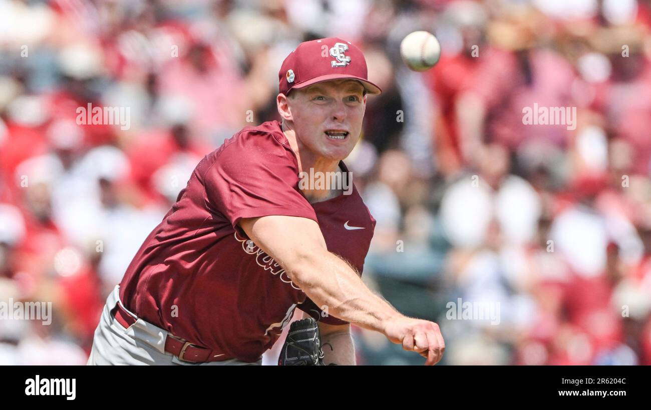 Santa Clara pitcher Cole Kitchen (14) throws back to first base against ...