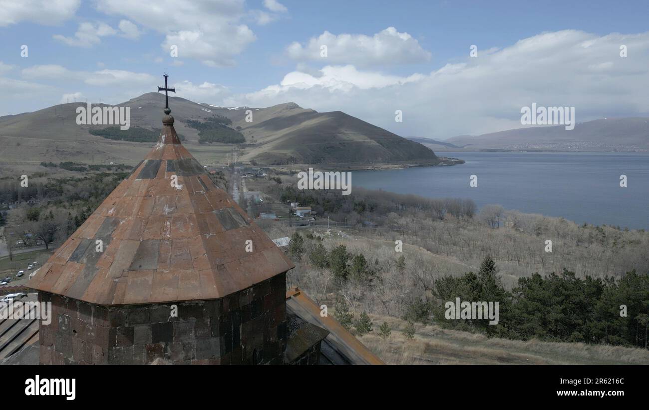 The Sevanank Monastery Complex in Armenia. Monastery buildings with crosses, on the background ...