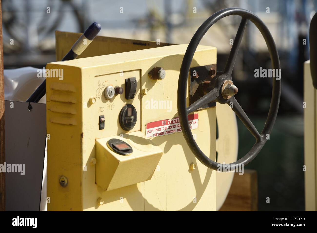A close-up shot of a small engine interior, featuring a dashboard ...