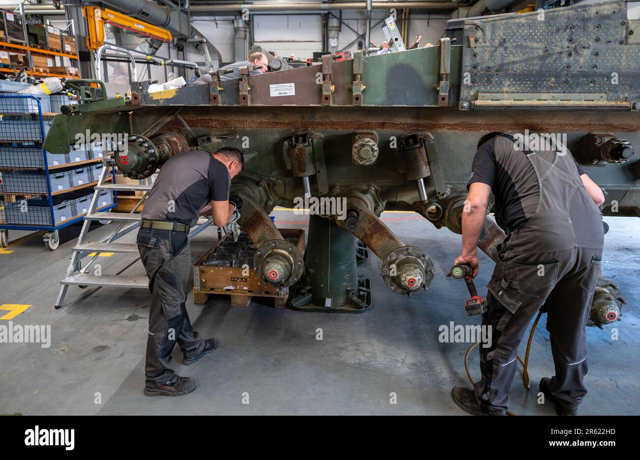06 June 2023, Lower Saxony, Unterlüß: Rheinmetall employees prepare a ...