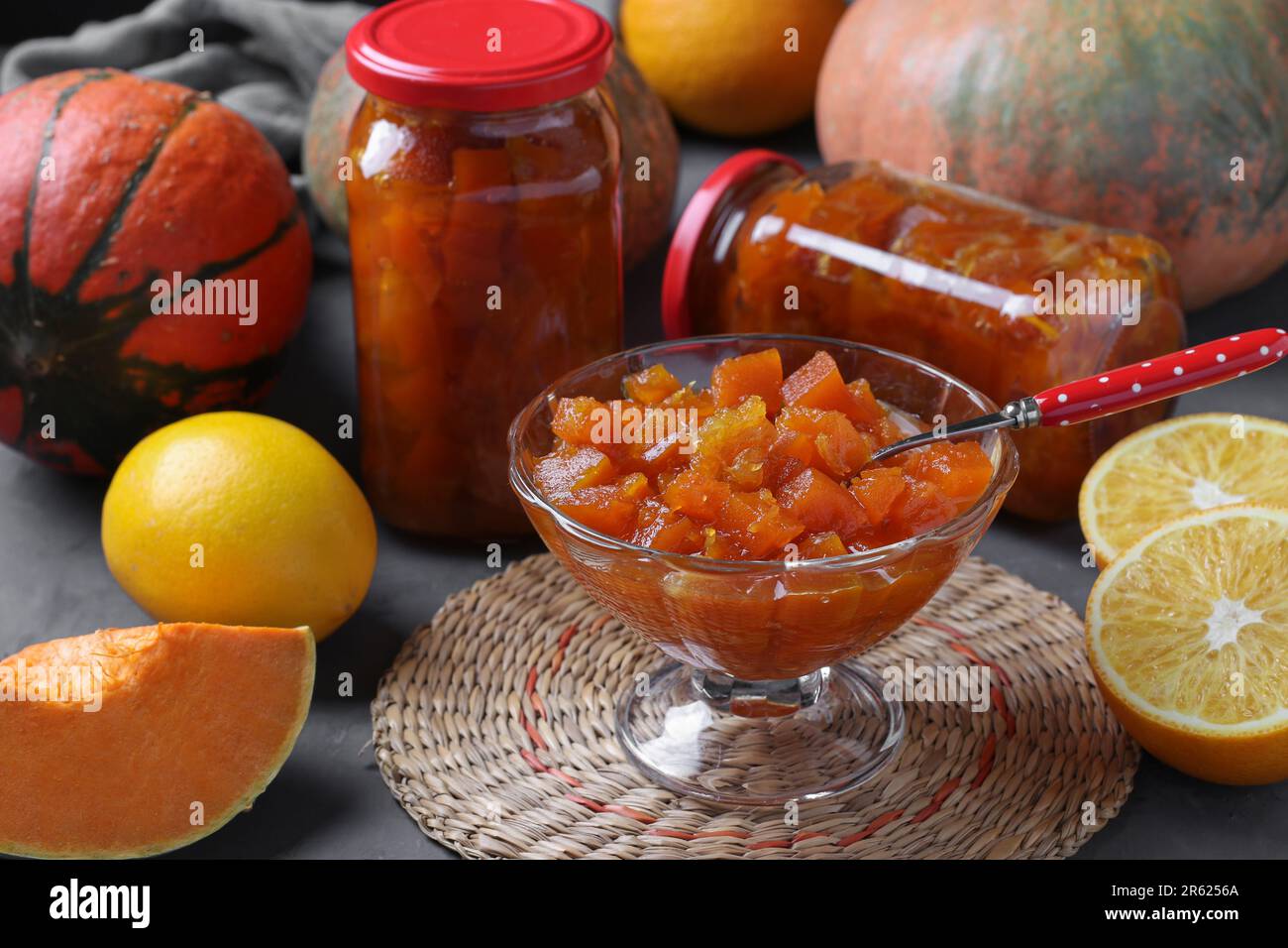 Homemade pumpkin jam with lemon and orange in bowl and in jars Stock ...
