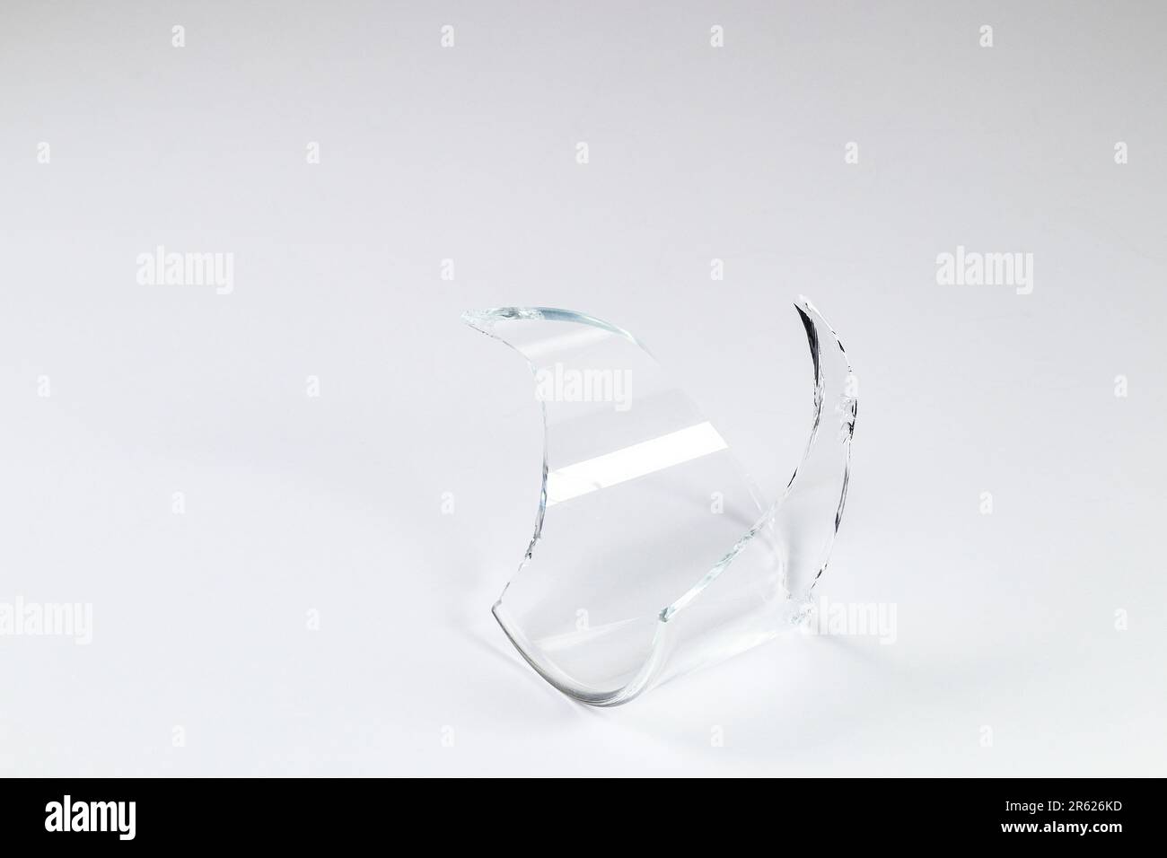 sharp Pieces of broken glass isolated on white background Stock Photo ...