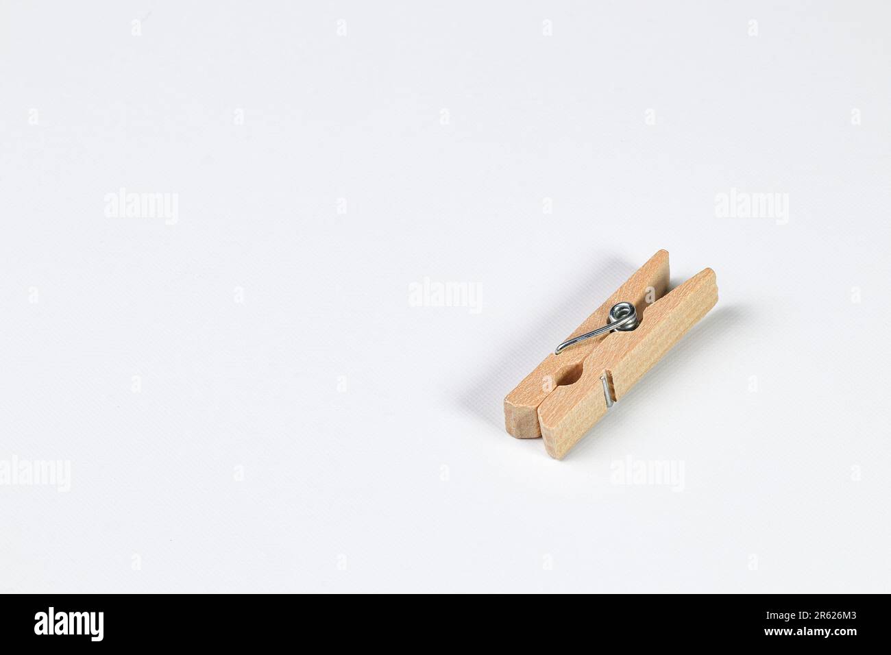 Mini wooden clothespin collection isolated on white background ...